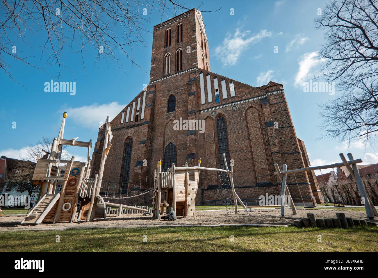 Wismar, Germany - March 30, 2026: A modern wooden children's playground ...