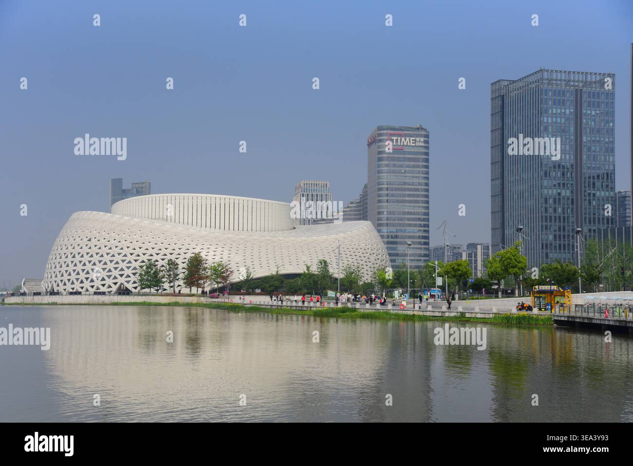 Visitors enjoy the spring scenery at Jinsha Lake Park in Hangzhou, east ...