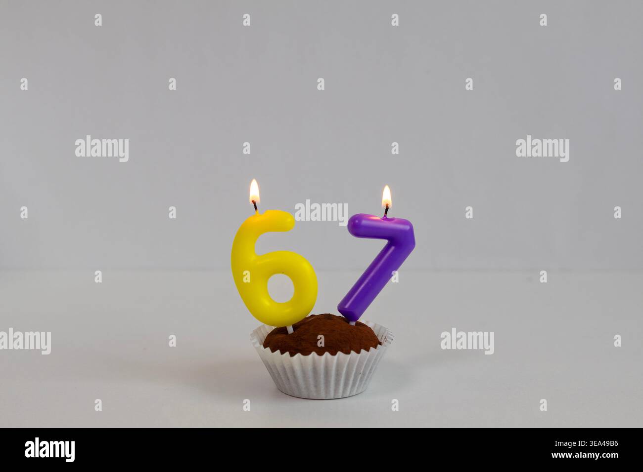Six Seven birthday meme concept with cupcake and number candles on ...