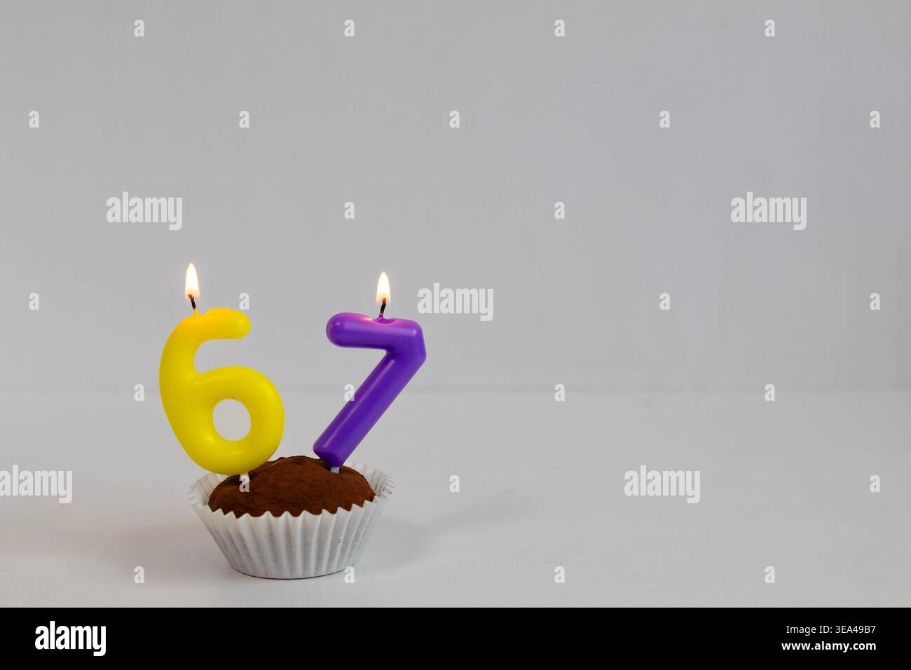 Six Seven birthday meme concept with cupcake and number candles on ...
