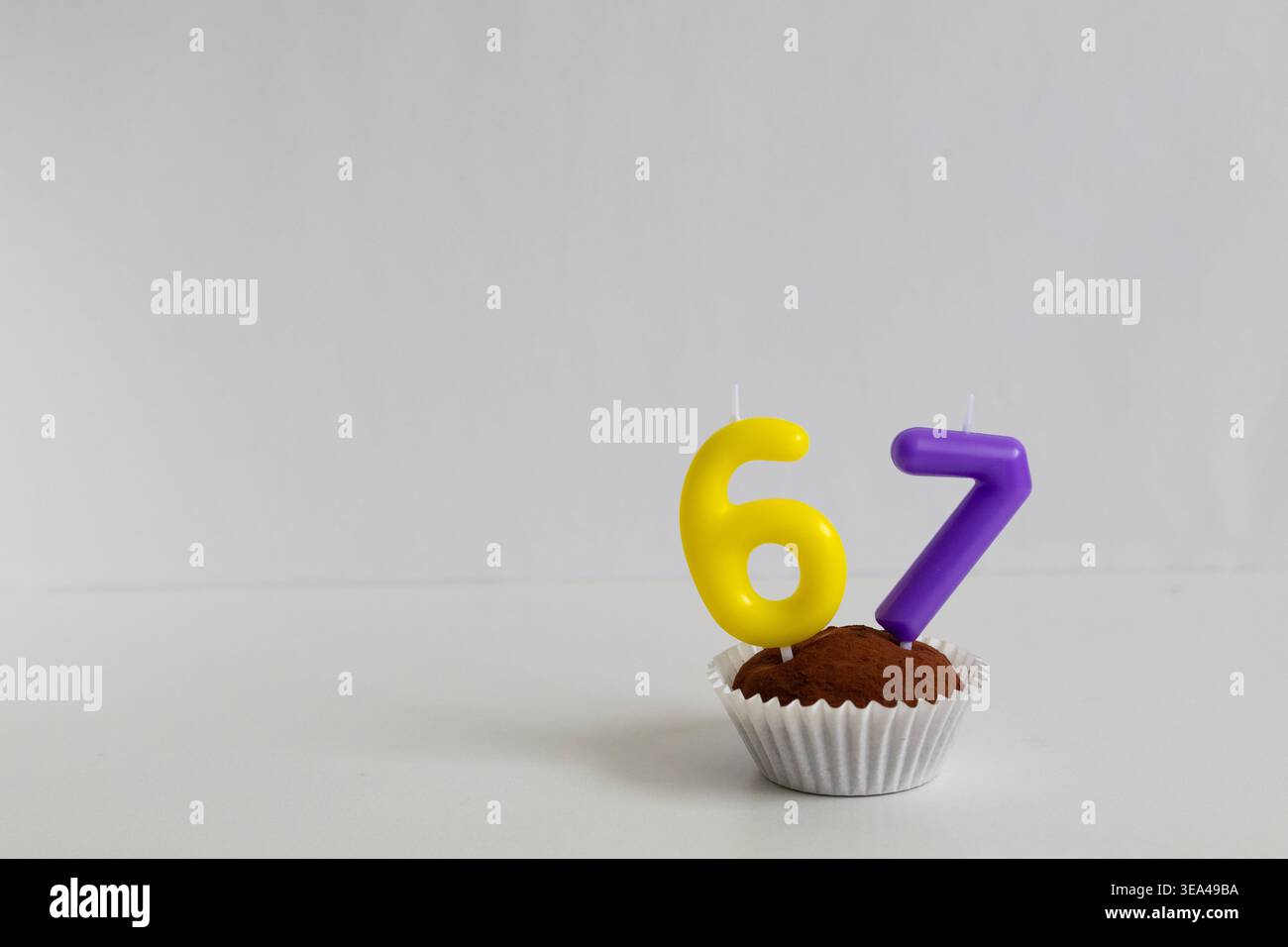 Six Seven birthday meme concept with cupcake and number candles on ...