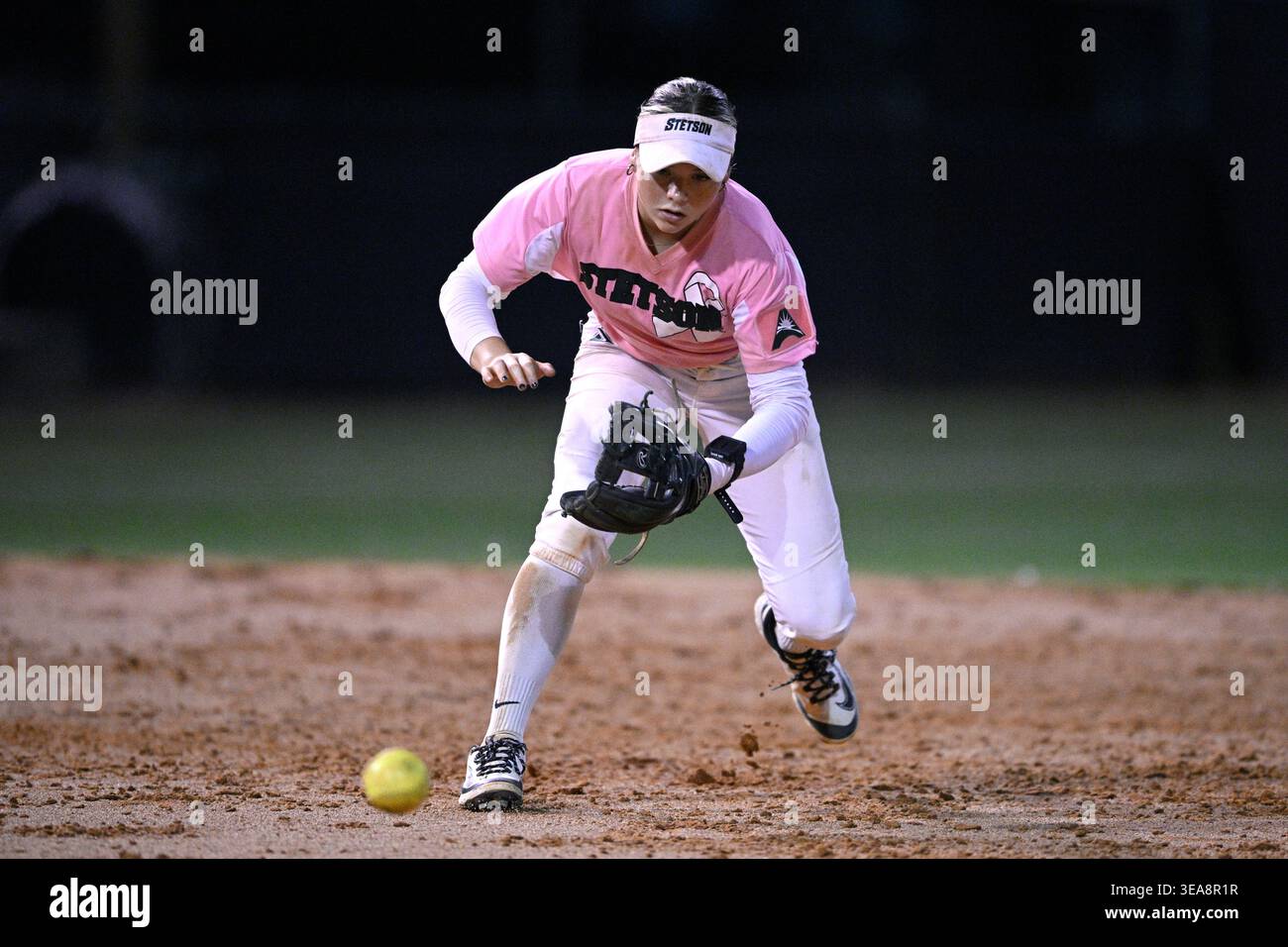 Stetson infielder Addison Foster fields a ground ball during an NCAA ...