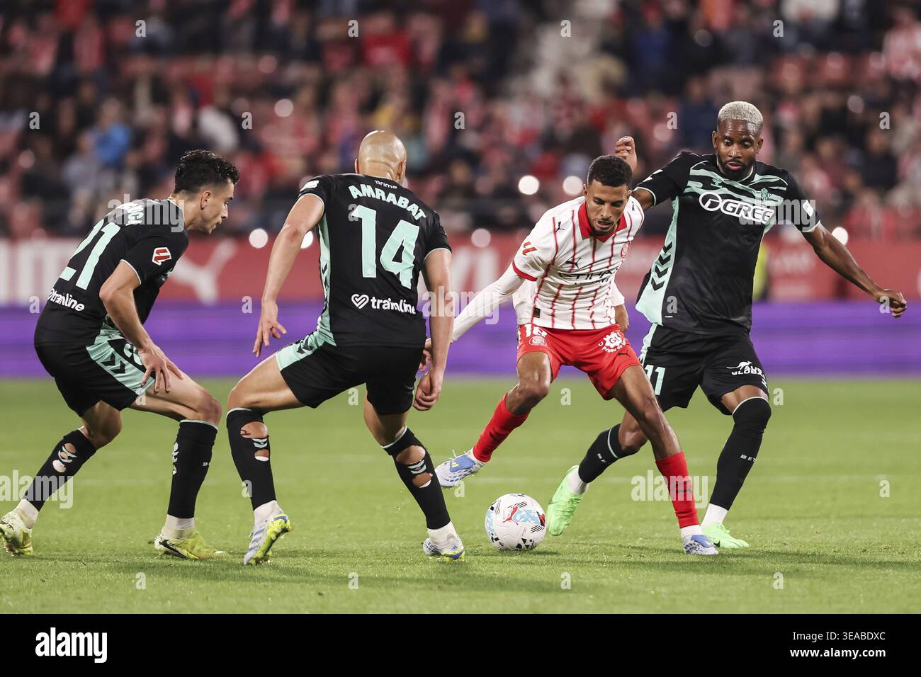 Azzedine Ounahi of Girona FC and Cedric Bakambu of Real Betis during ...