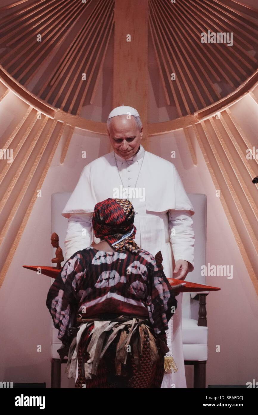 Pope Leo XIV is presented with a gift as he meets with young people and ...