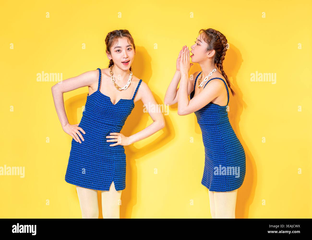 Two women in matching hi-res stock photography and images - Alamy