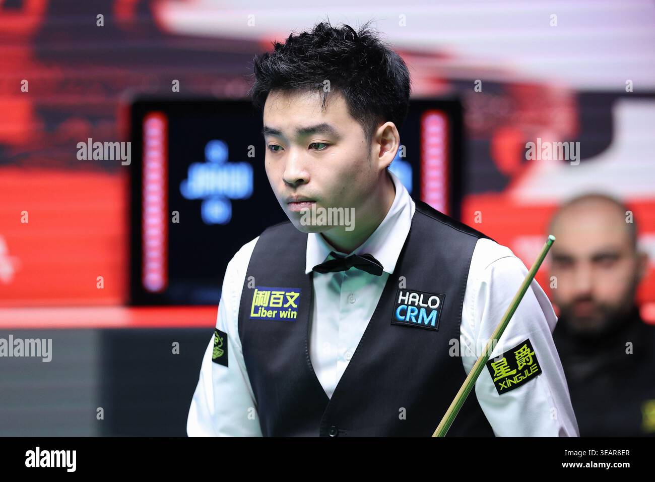 si Jiahui (China) looks on during Round 1 of the Halo World Snooker ...