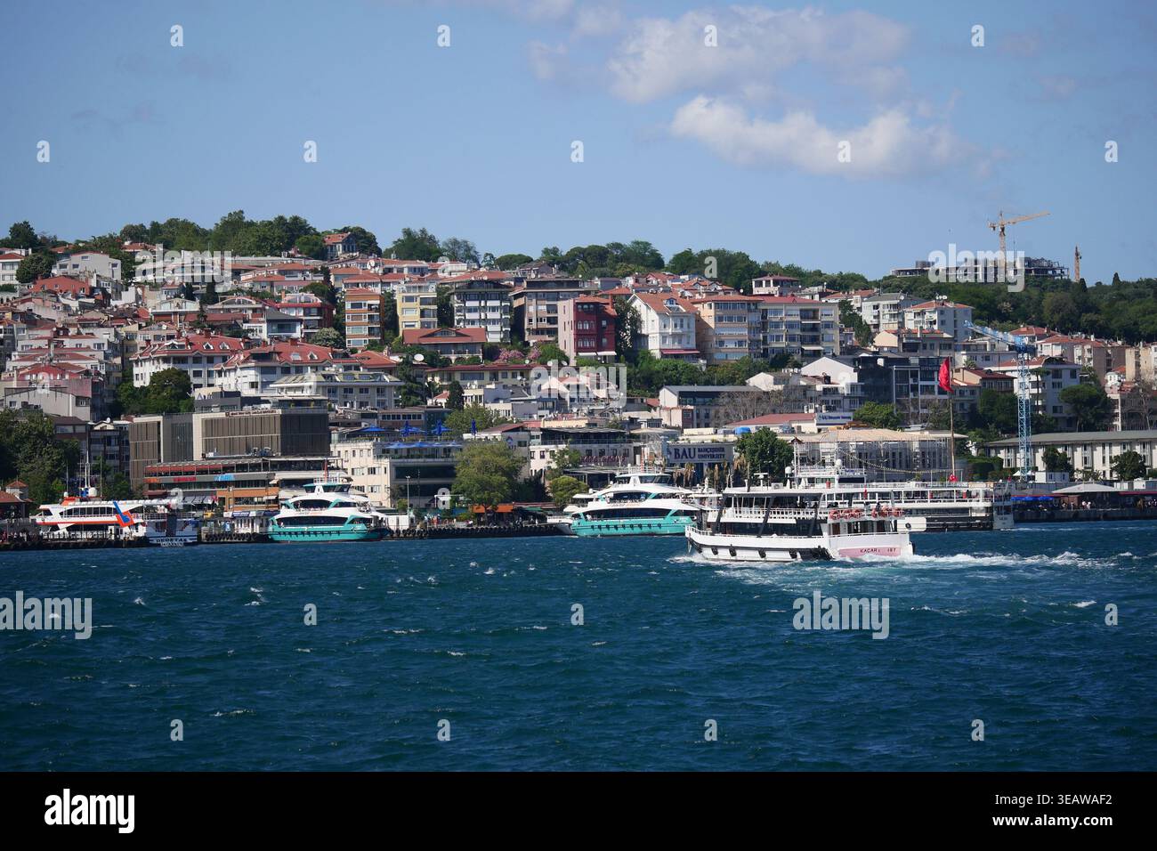 turkey istanbul 28 june 2025. Boats move through water near city ...