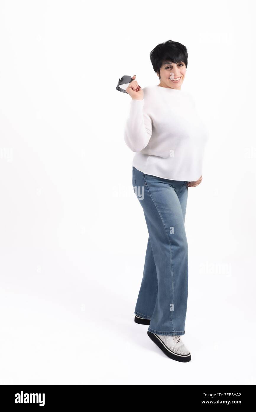 Woman holding object hi-res stock photography and images - Alamy