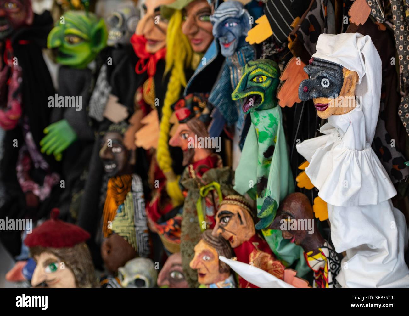 Traditional marionette puppet of Pulcinella displayed alongside other ...