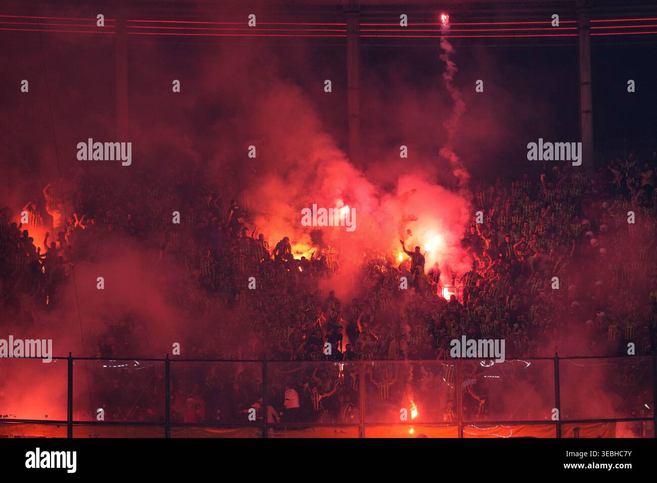 Fenerbahce's supporters light flares during a Turkish Super Lig soccer ...