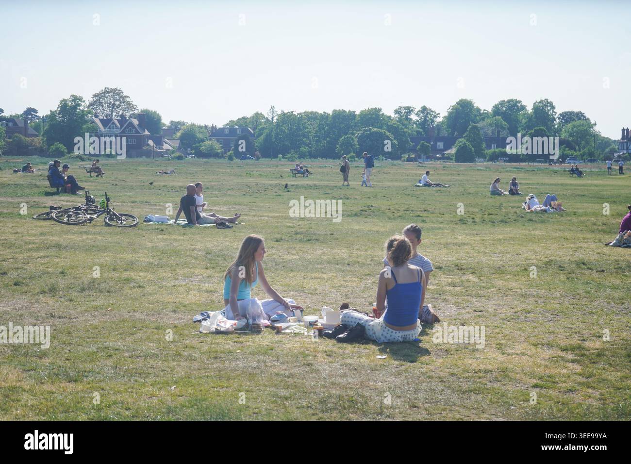 Wimbledon, London UK. 9 May 2026 People bask in the warm afternoon ...