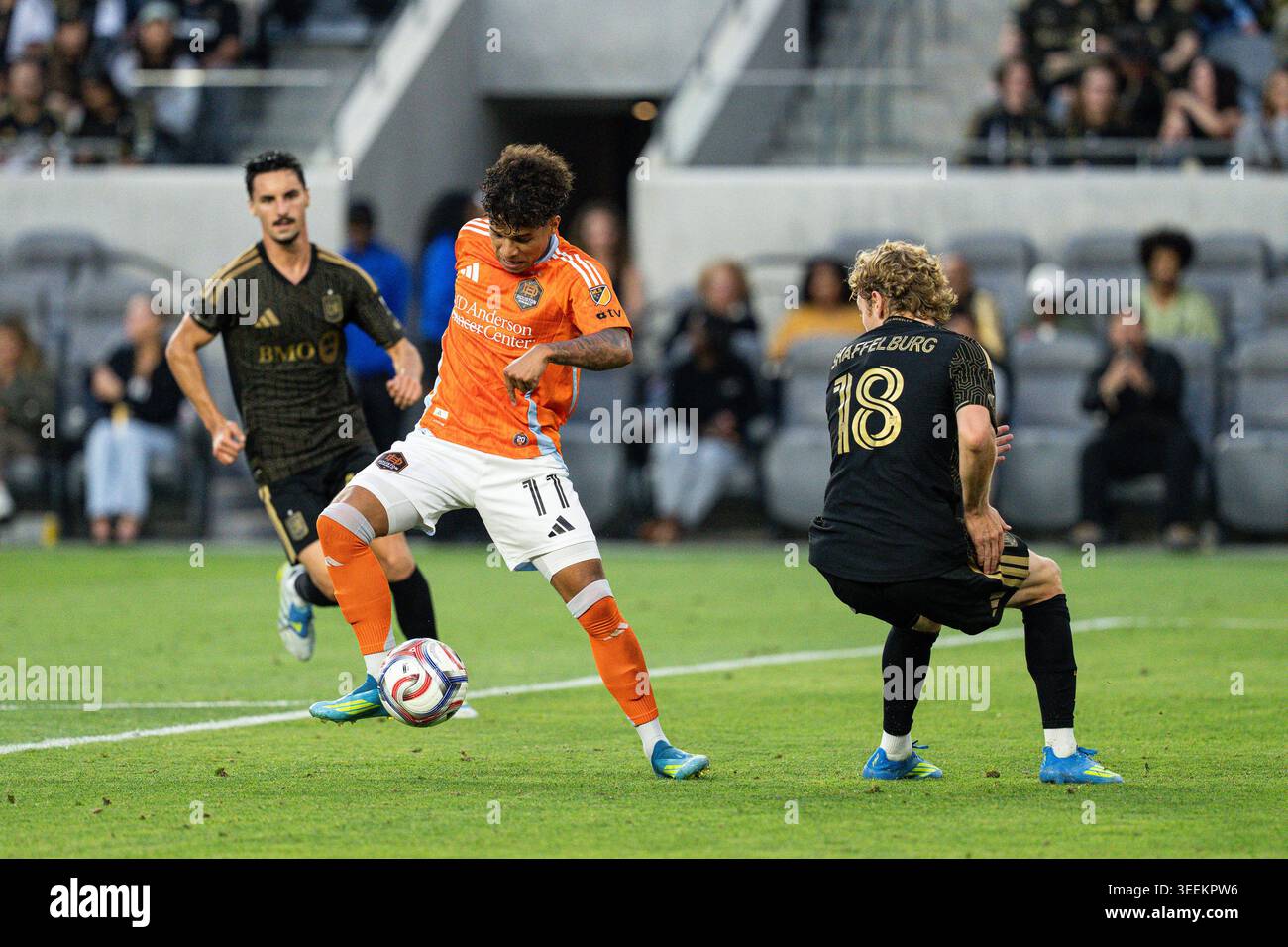 Houston Dynamo midfielder Lawrence Ennali (11) controls possession ...