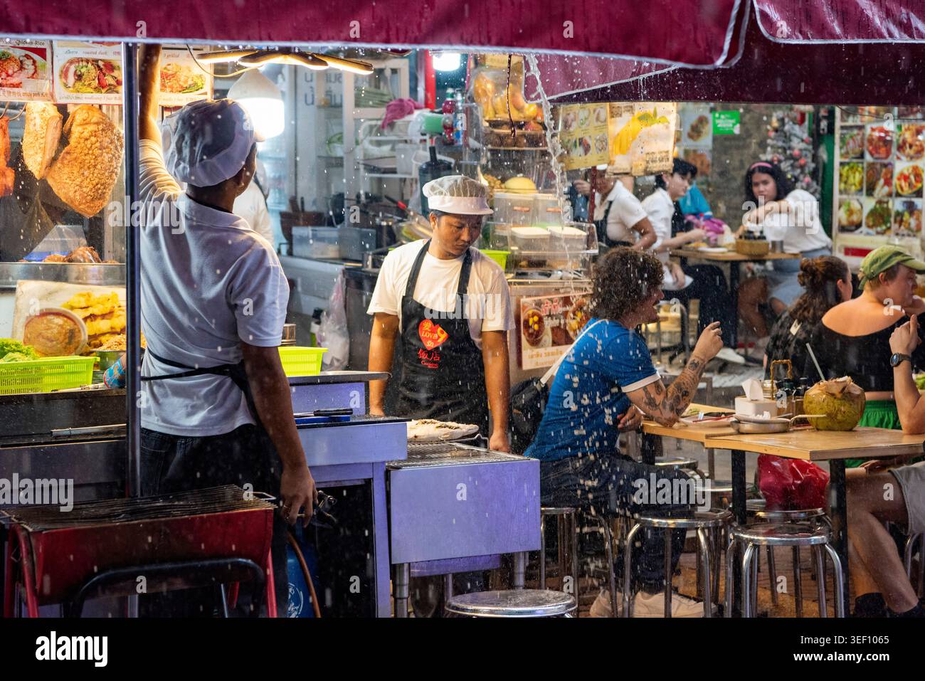 Raine weather at Night Streetmarket on Yaowarat Road in Chinatown in ...