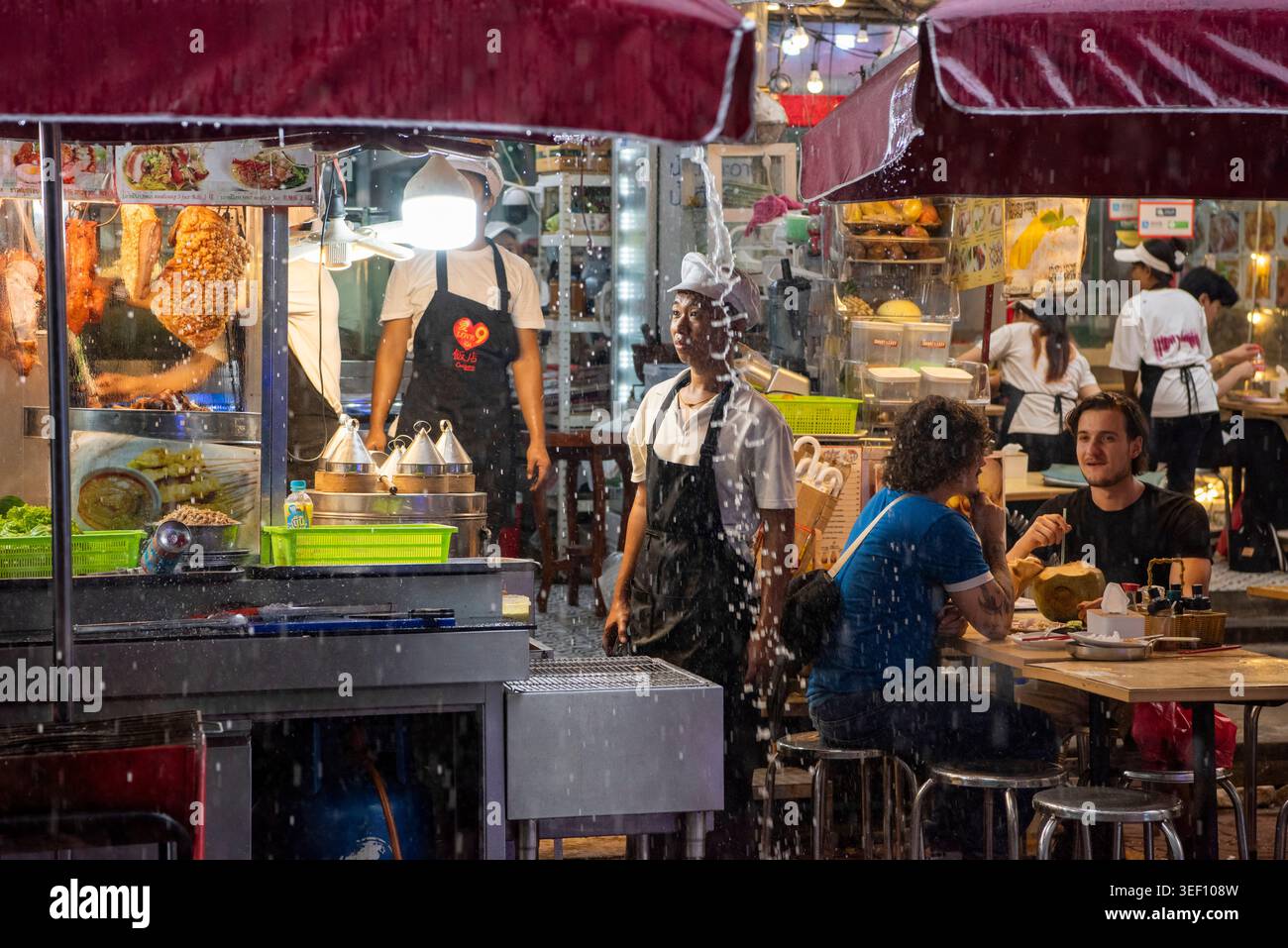 Raine weather at Night Streetmarket on Yaowarat Road in Chinatown in ...