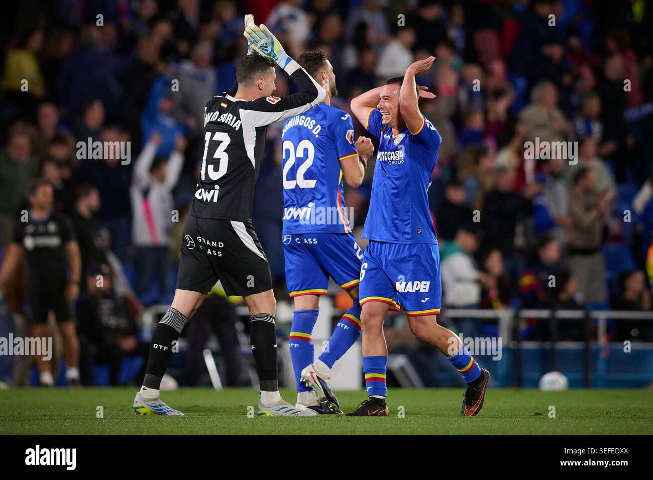 Getafe CF’s David Soria (l) and Damian Caceres celebrate a goal during ...