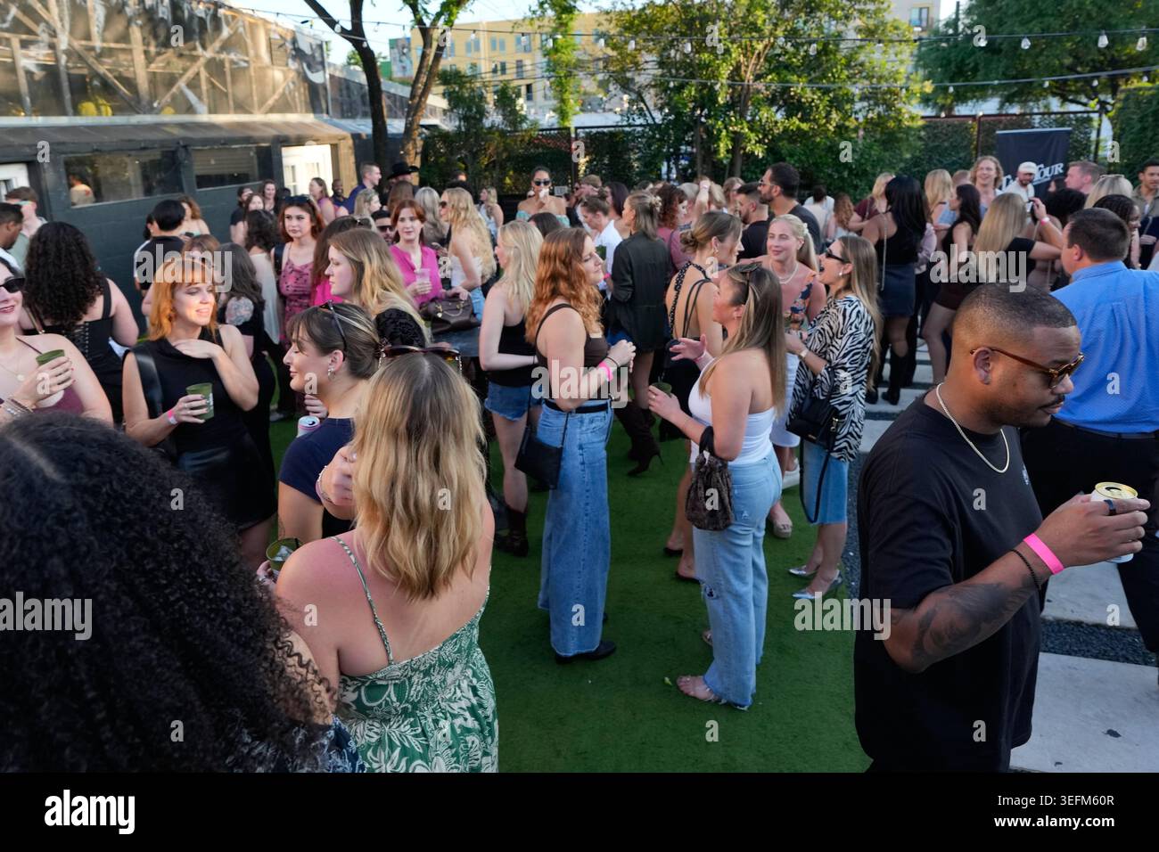 People attend a Tall Tour event Saturday, May 9, 2026, in Austin, Texas ...