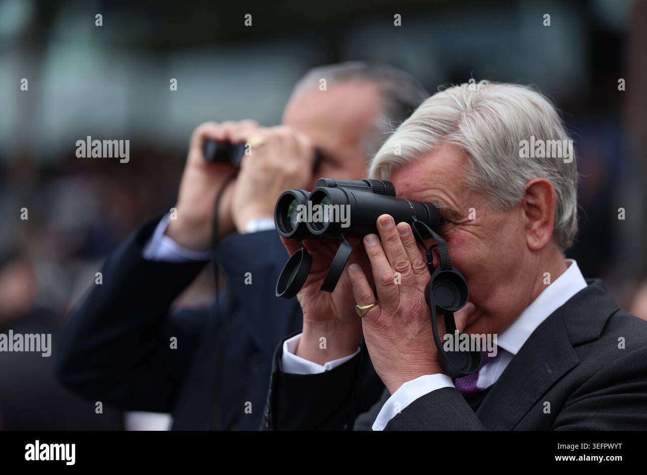 Race goers watch the Sky Sports Racing Aston Park Stakes (Group 3) race ...