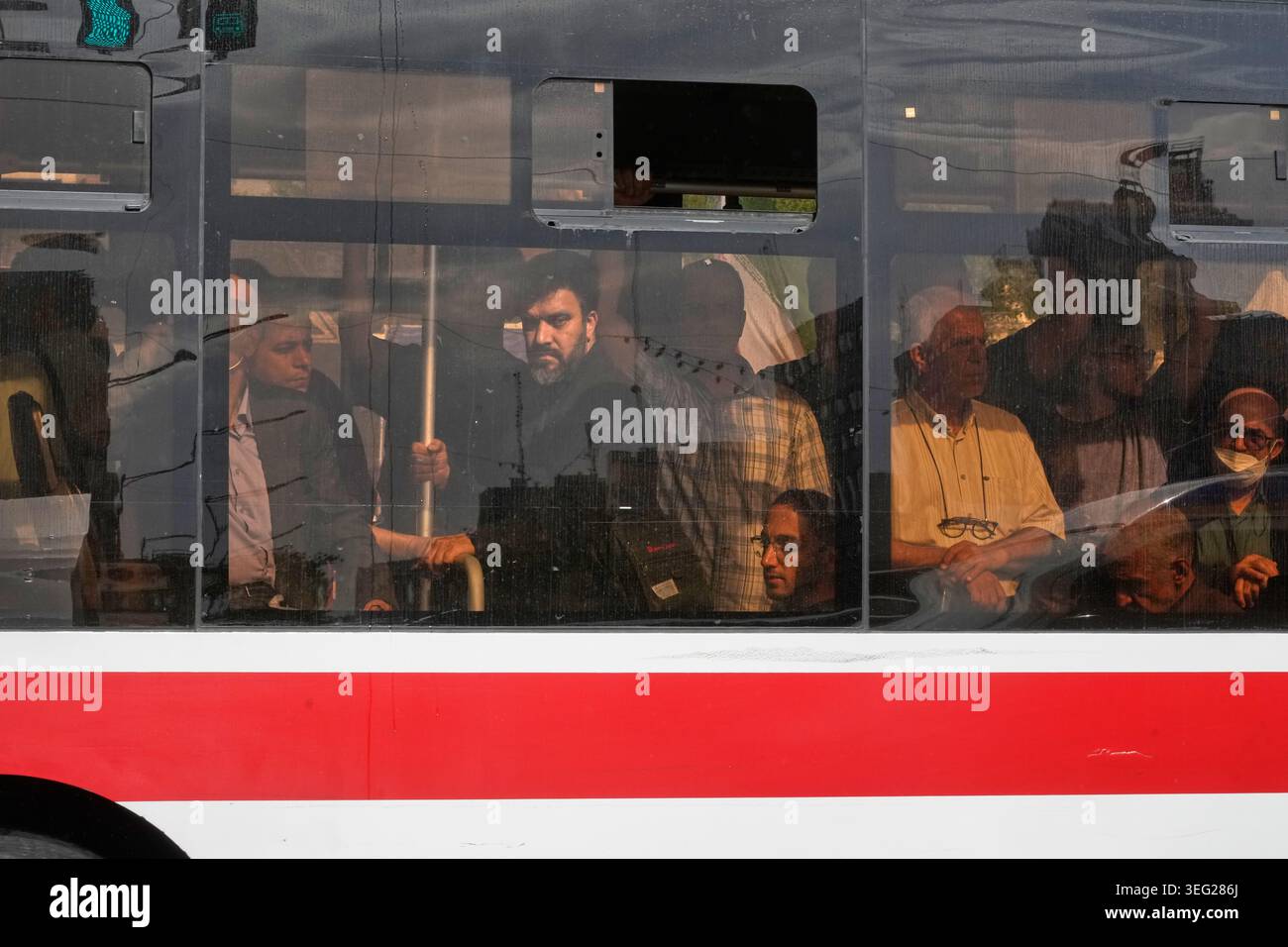 Passengers ride a BRT bus in downtown Tehran, Iran, Sunday, May 17 ...
