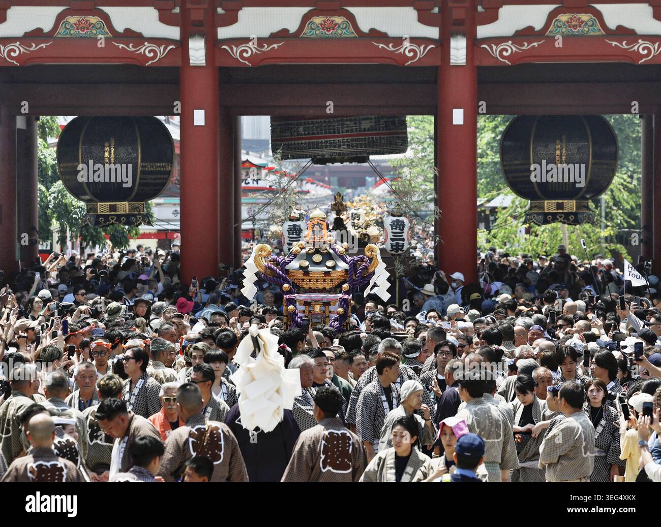 People participate in Asakusa Shrine's Sanja festival in Tokyo on May ...