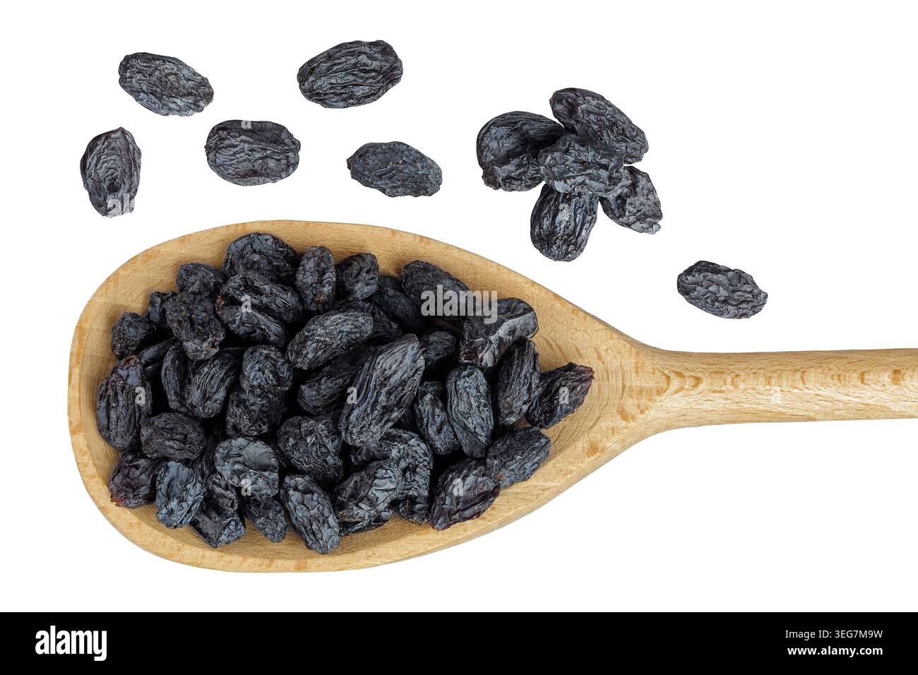 black raisins isolated on a white background. Top view. Flat lay Stock ...