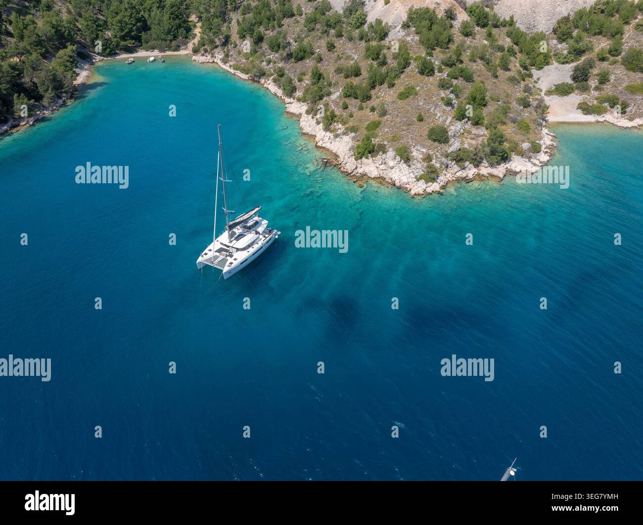 Aerial View of Catamaran Anchored in Turquoise Adriatic Cove, Croatia ...