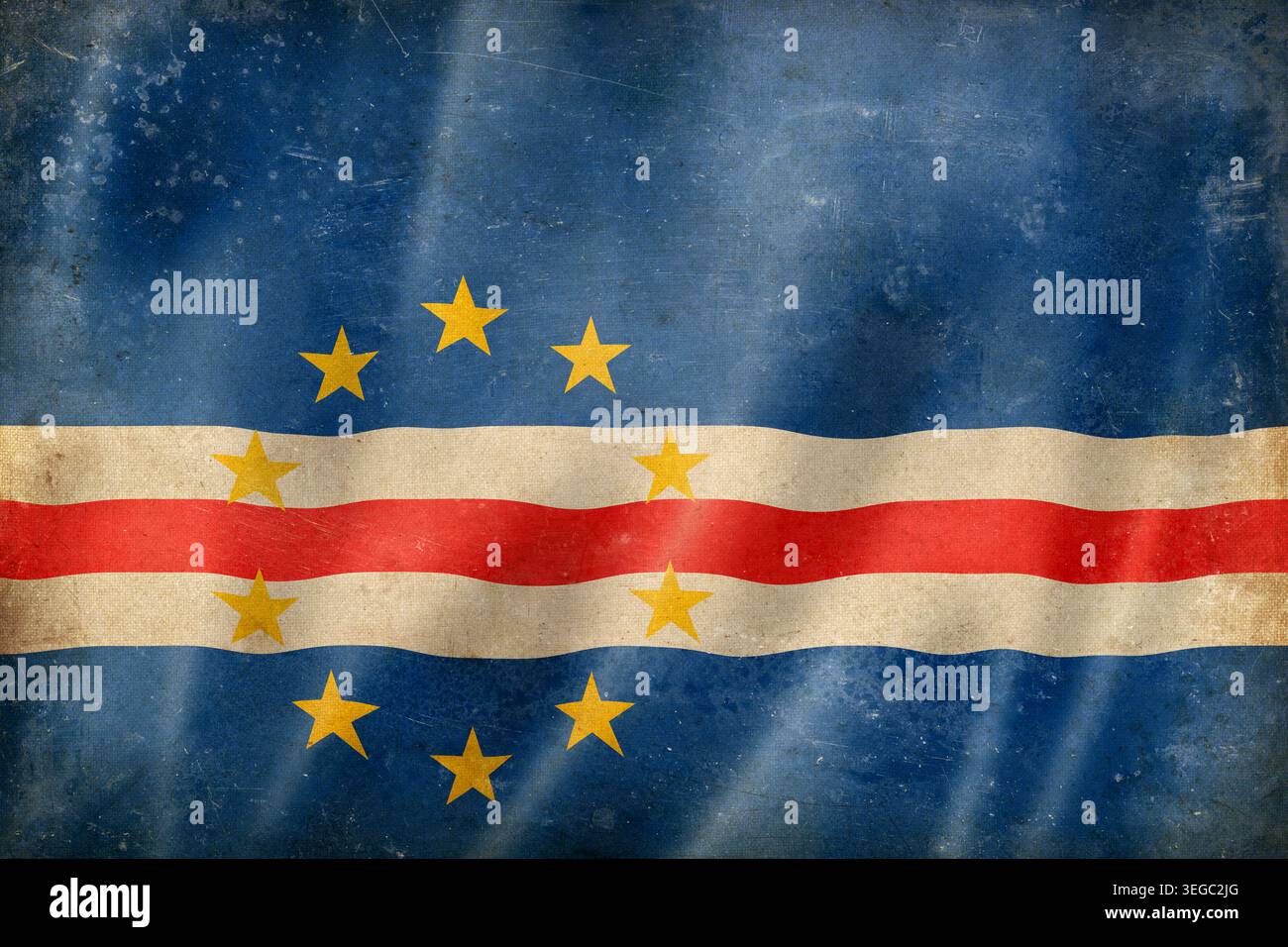 Old waving Cape verde flag, worn, stained, and crumpled. Textured canva ...
