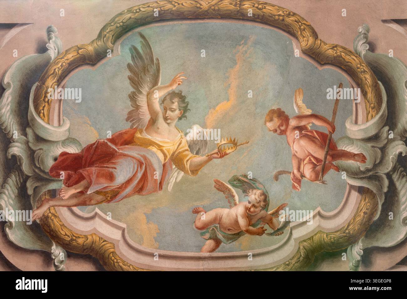 CREMA, ITALY - MARCH 20, 2026: The fresco of baroque angels with the ...