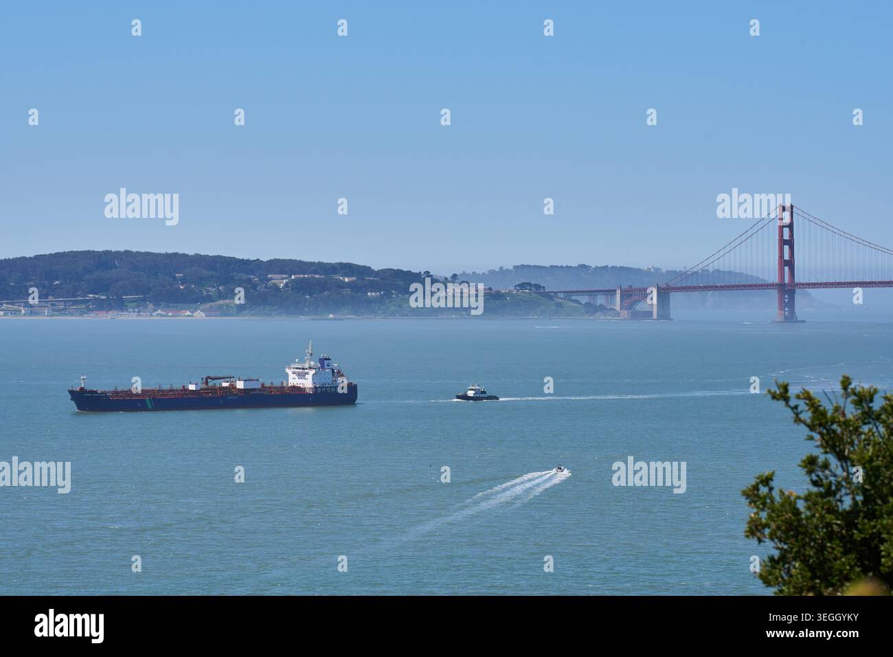 A tanker and other vessels pass through the San Francisco Bay, Tuesday ...
