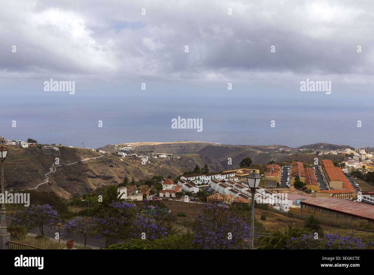 Cloudy volcanic mountain landscape overlooking the Atlantic Ocean in ...