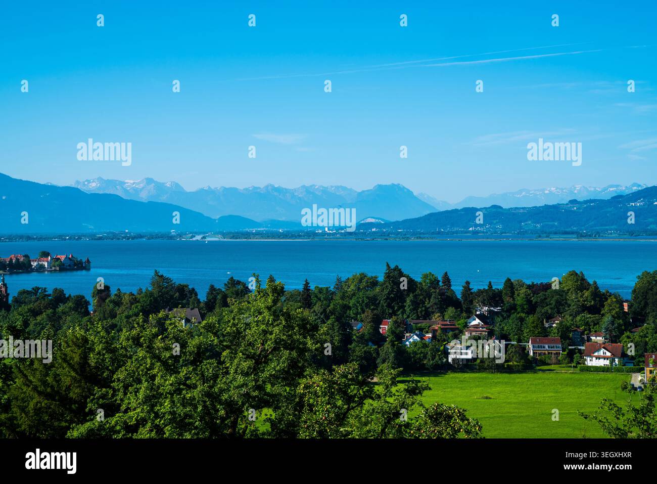 Germany, Scenic morning aerial above Lindau houses and Austrian Alps ...