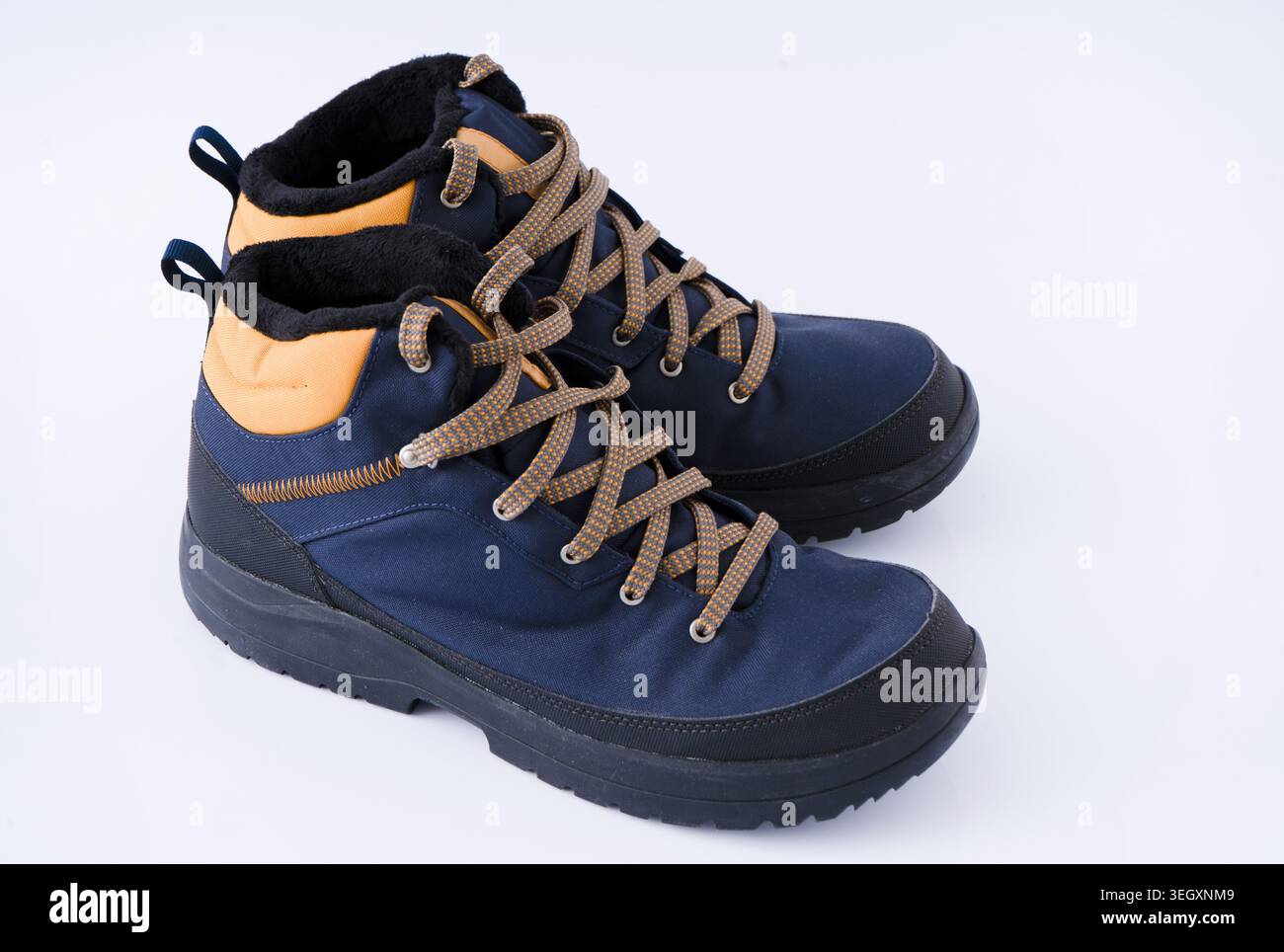 Trekking boots for hiking on a white background Stock Photo - Alamy
