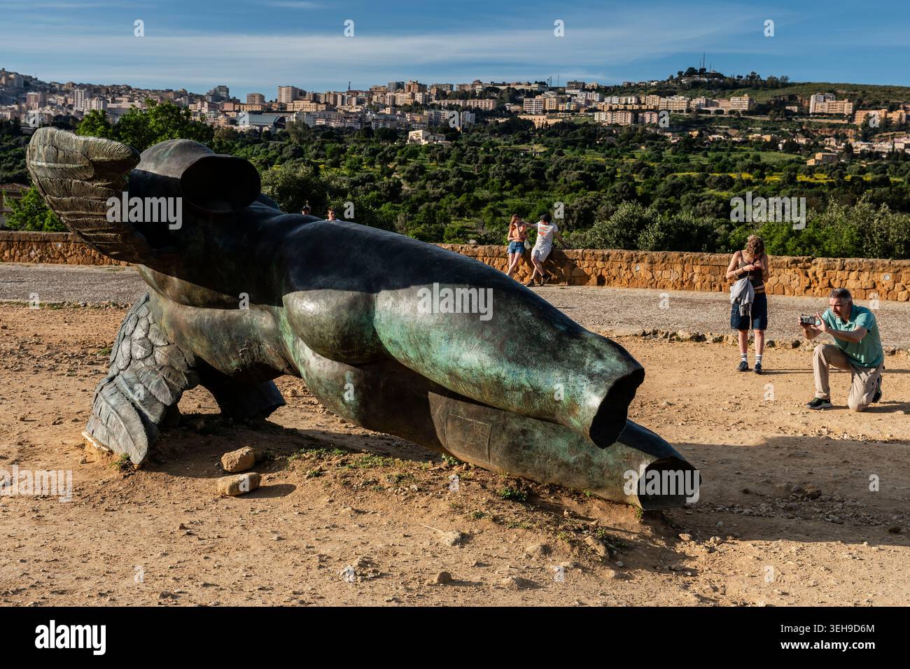 Fallen Icarus, recumbent bronze sculpture of a warrior, Igor Mitoraj ...