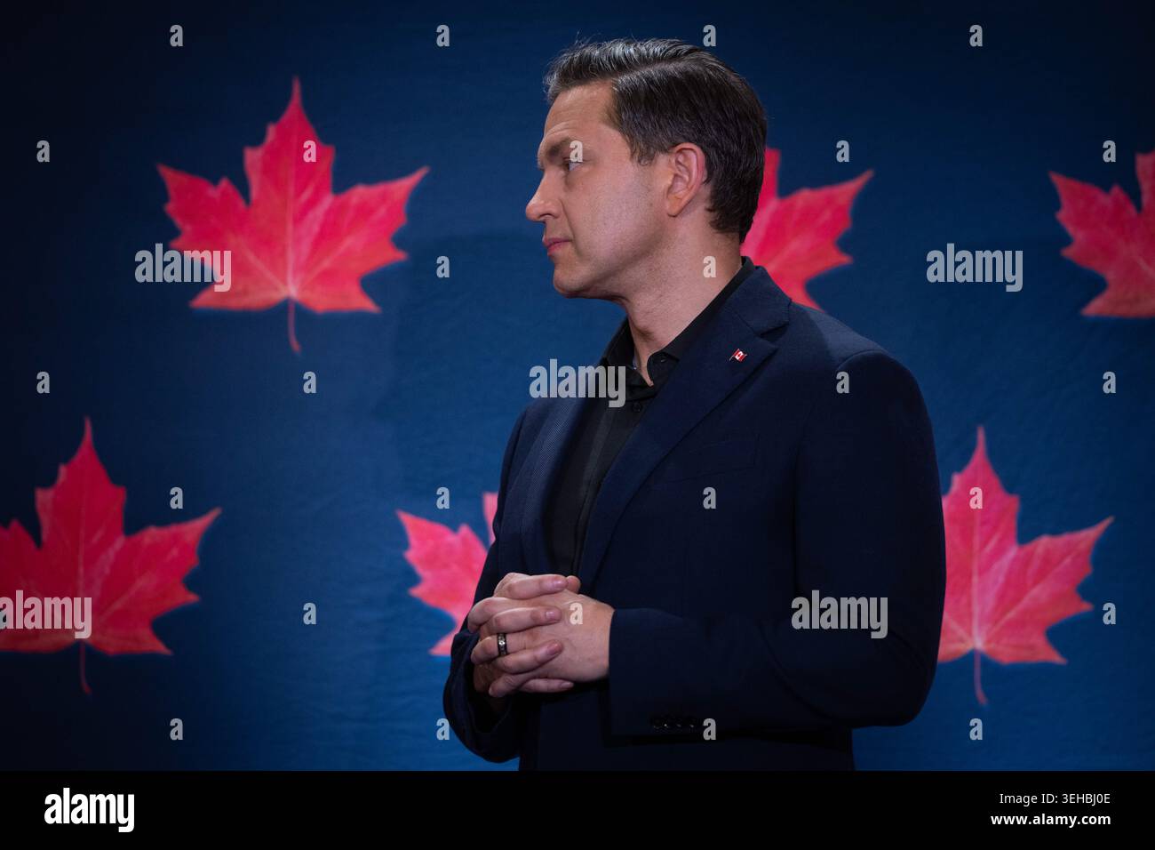 Conservative Leader Pierre Poilievre looks on during the party's town ...