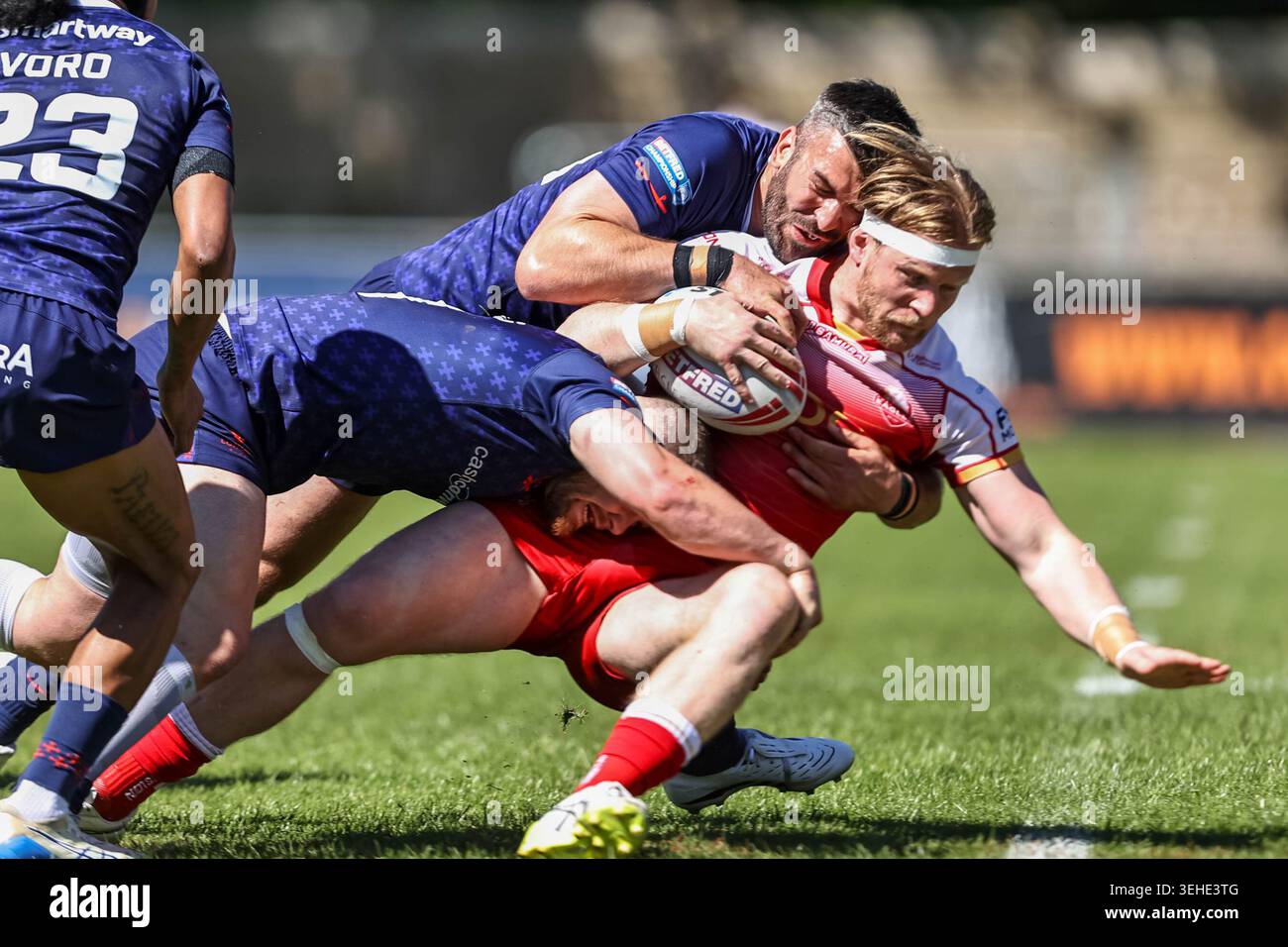 Will Lovell tackles Connor bower during the BETFRED Championship match ...