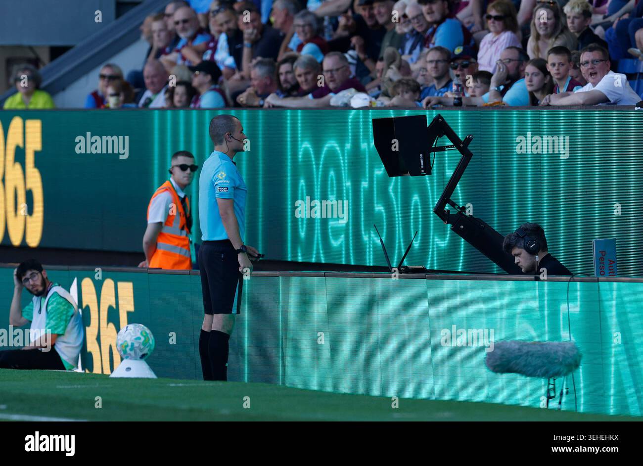 Referee looks at VAR for a possible handball during the Premier League ...