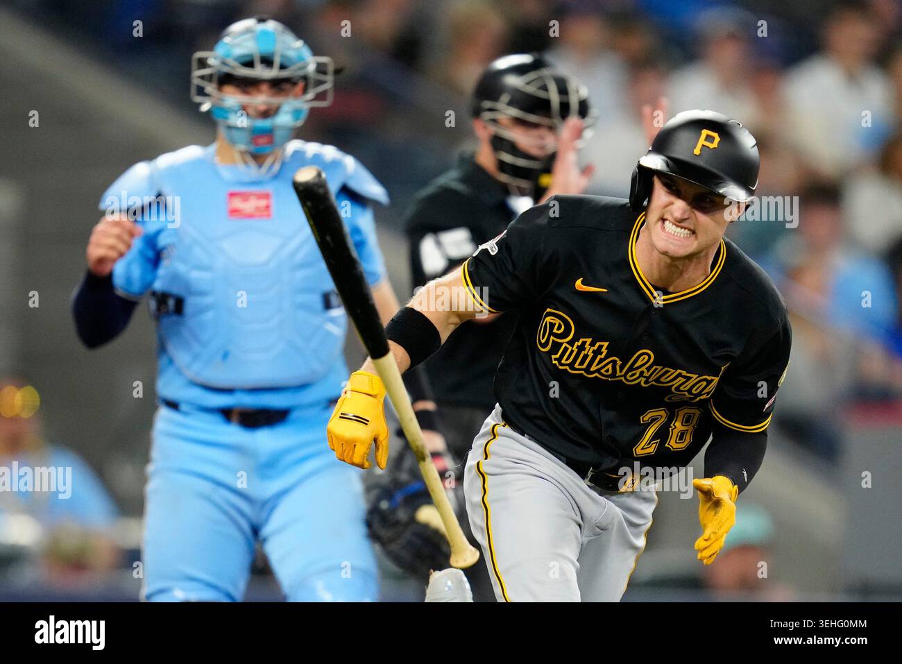 Pittsburgh Pirates' Jake Mangum (28) reacts after getting hit by a ...
