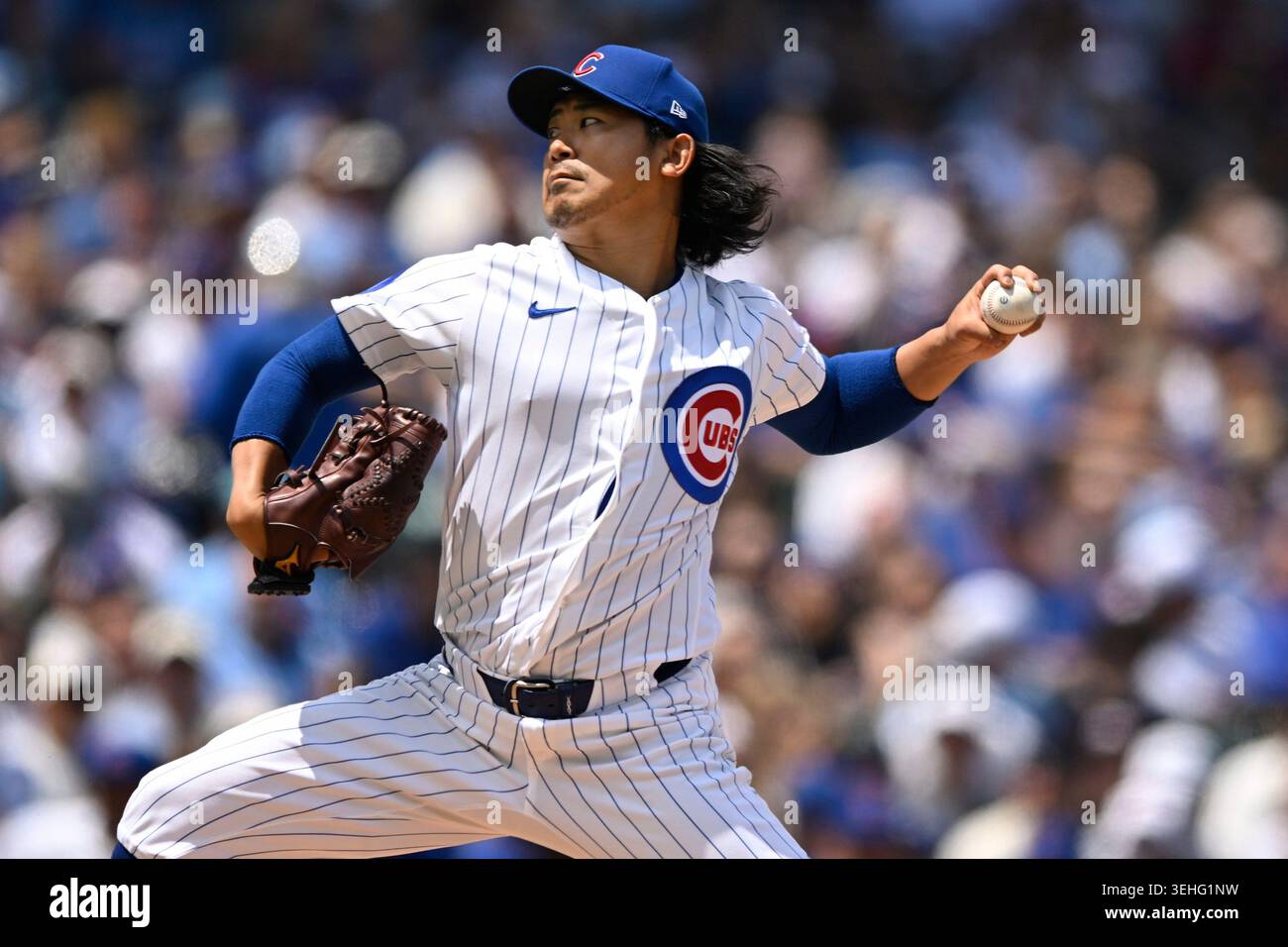 Chicago Cubs starter Shota Imanaga delivers a pitch during the first ...