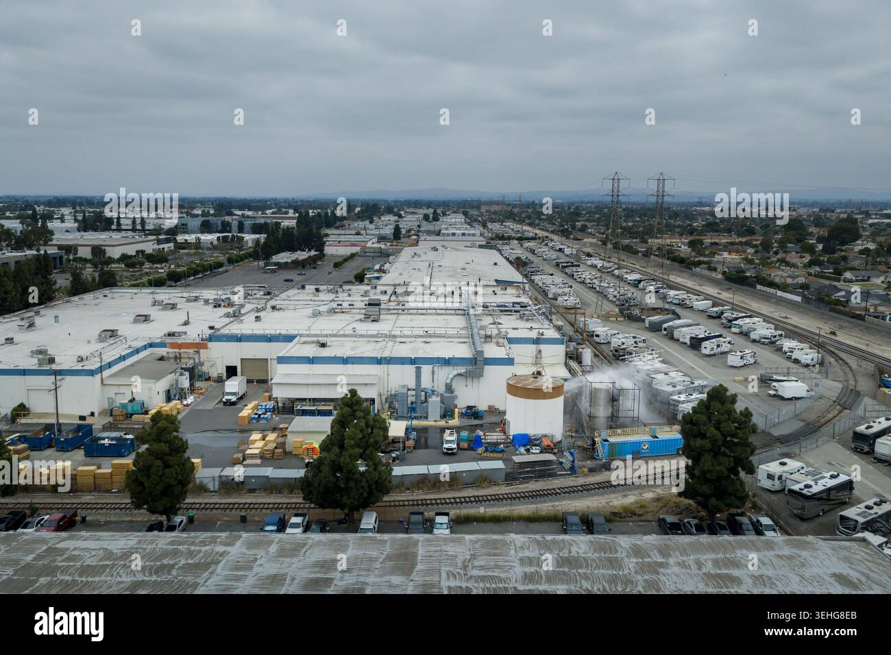Water is sprayed on a damaged tank at GKN AerospaceT n Garden Grove ...