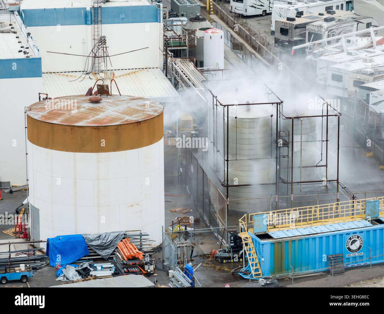 Water is sprayed on a damaged tank at GKN AerospaceT n Garden Grove ...