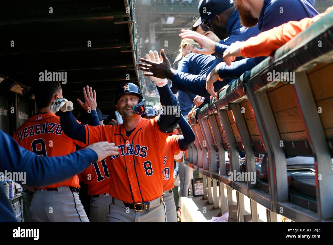 Houston Astros' Christian Walker (8) celebrates with teammates in the ...