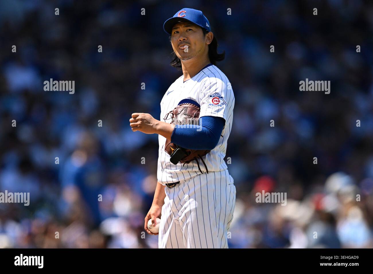 Chicago Cubs starting pitcher Shota Imanaga reacts after giving up a ...
