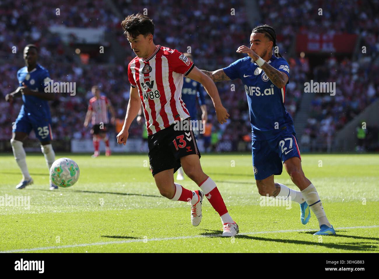 Luke O'Nien Of Sunderland is pressed by Malo Gusto of Chelsea during ...