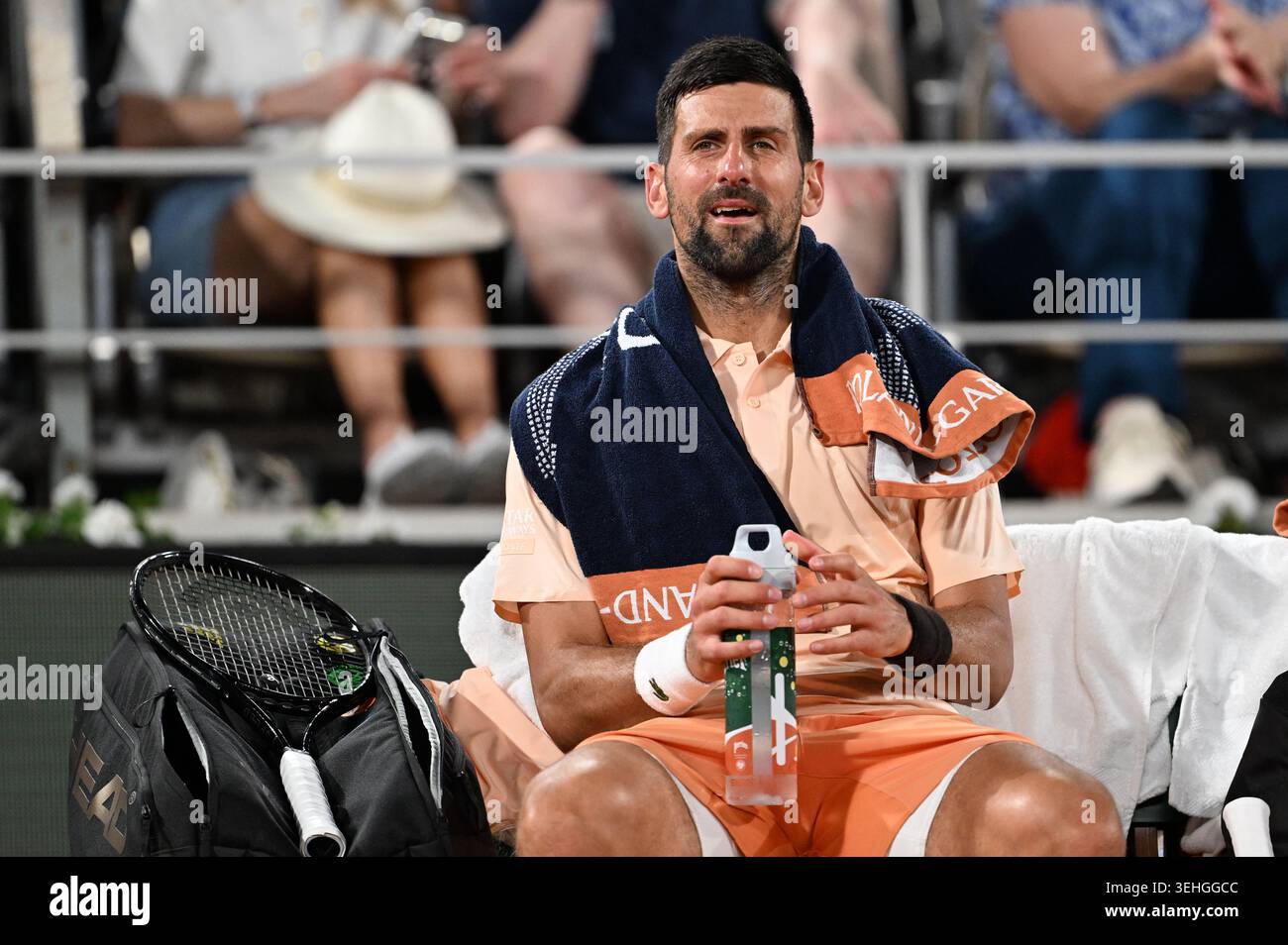 Novak Djokovic of Serbia attends a break during the first round men's ...
