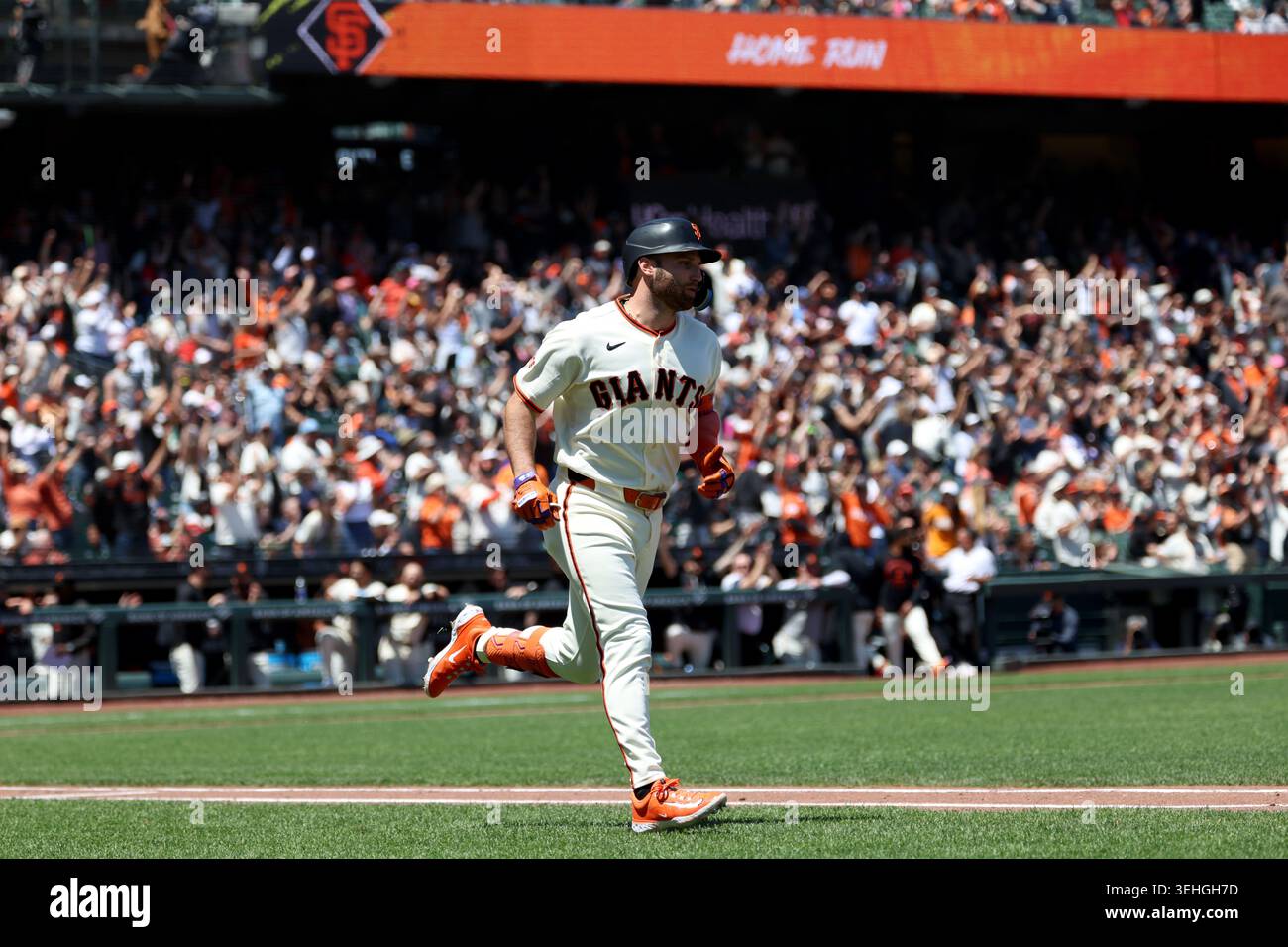 San Francisco Giants' Casey Schmitt rounds the bases after hitting a ...