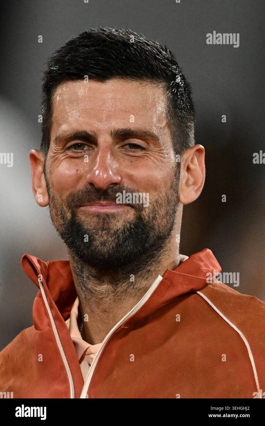 Novak Djokovic of Serbia smiles after winning the first round men's ...