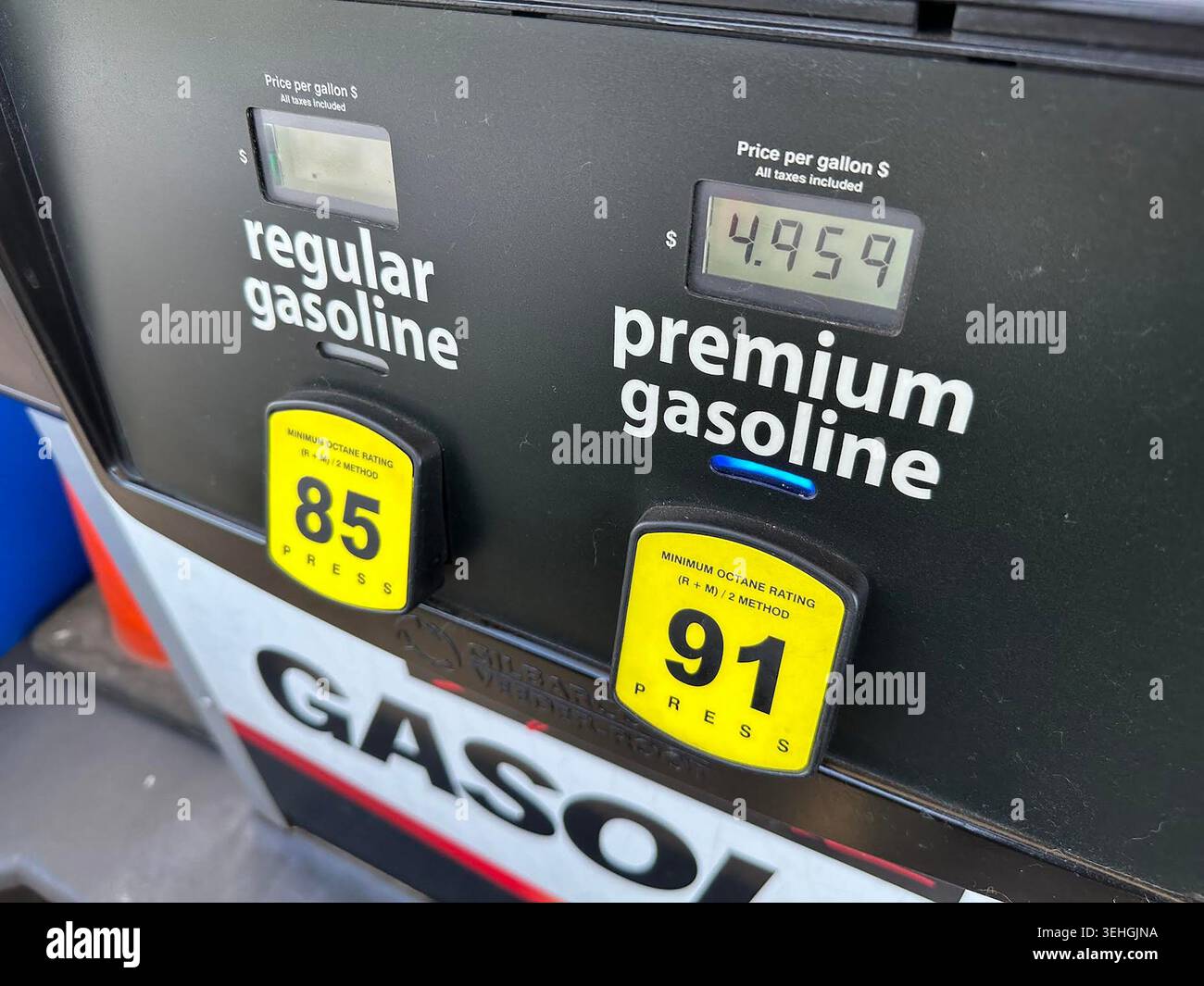 The per-gallon price for premium unleaded gasoline is displayed on the ...