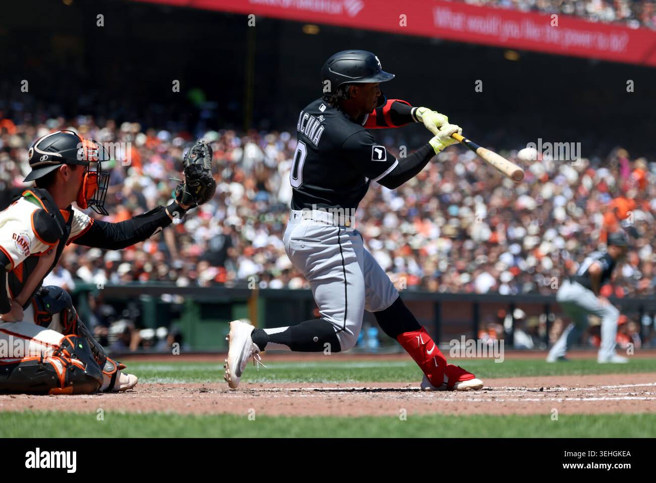 Chicago White Sox's Luisangel Acuña (0) hits an RBI sacrifice fly in ...