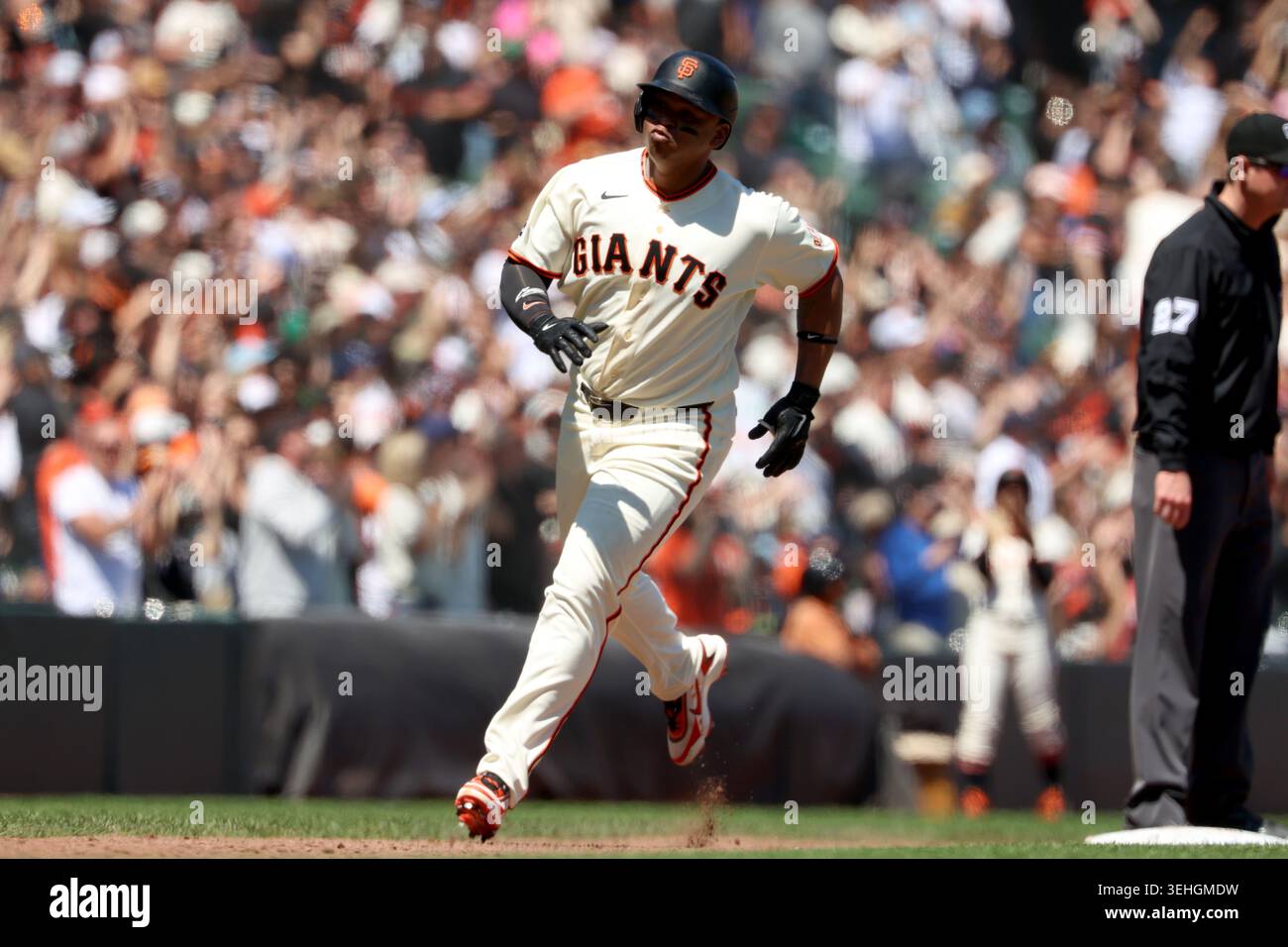 San Francisco Giants' Rafael Devers rounds the bases after hitting a ...