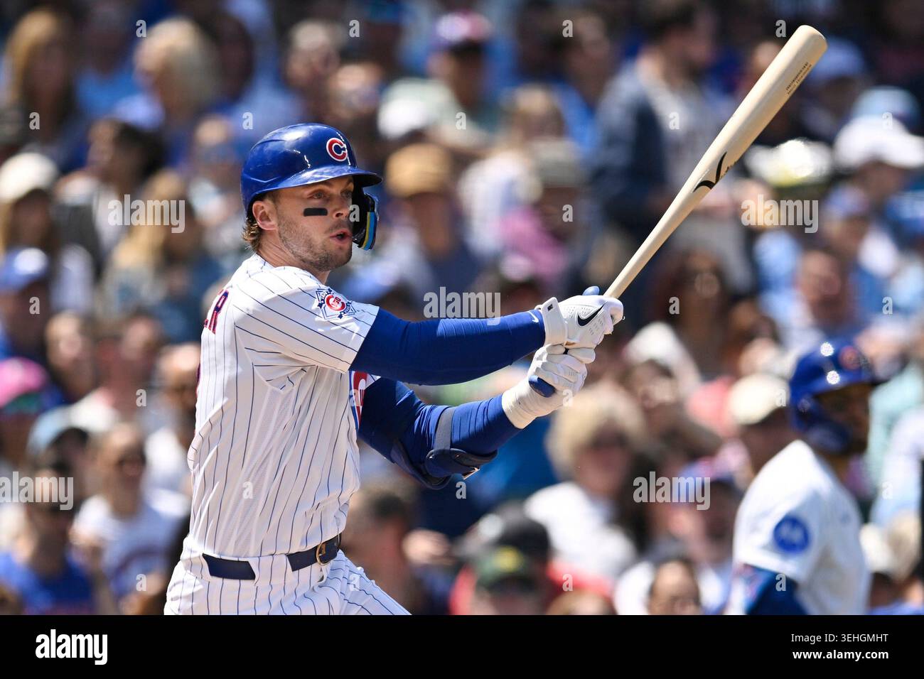 Chicago Cubs' Nico Hoerner watches his RBI single during the second ...