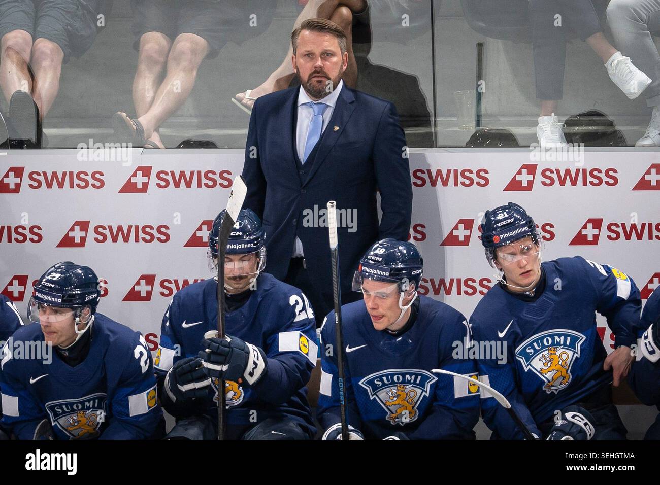 Antti Pennanen, head coach of Finland, background center, during the ...